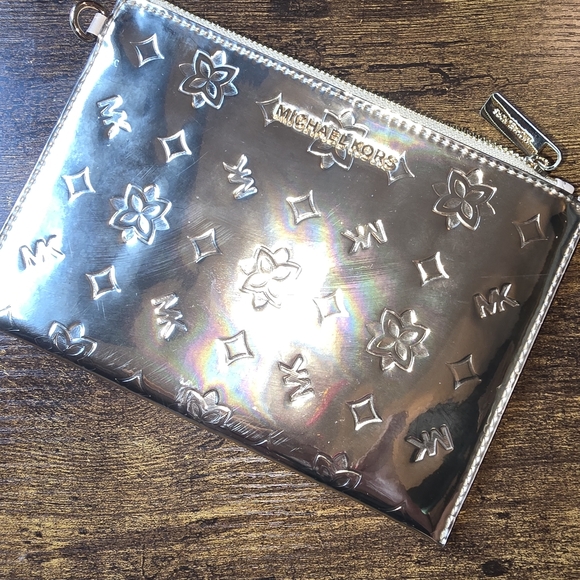 Michael Kors | Bags | Michael Kors Silver Metallic Pouch Bag | Poshmark